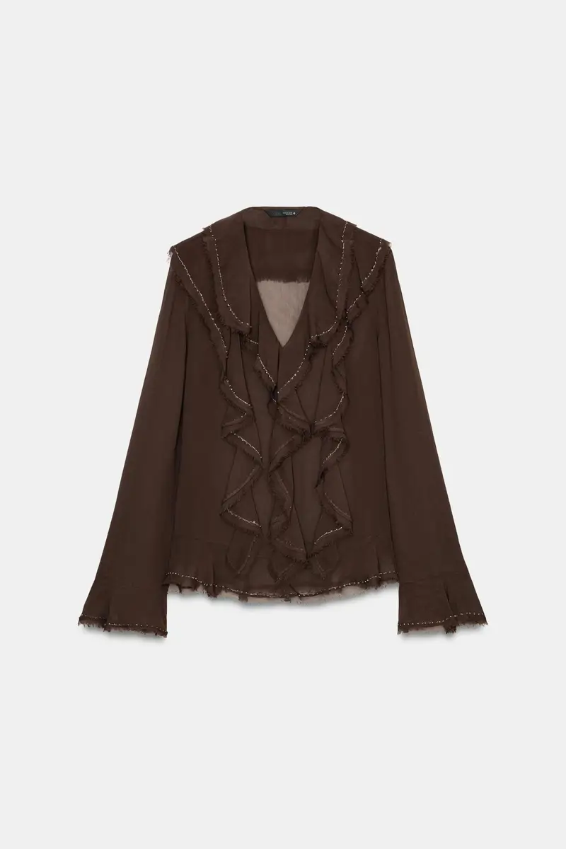 10 blusas de Zara rebajadas para llevar con pantalones blancos en ...